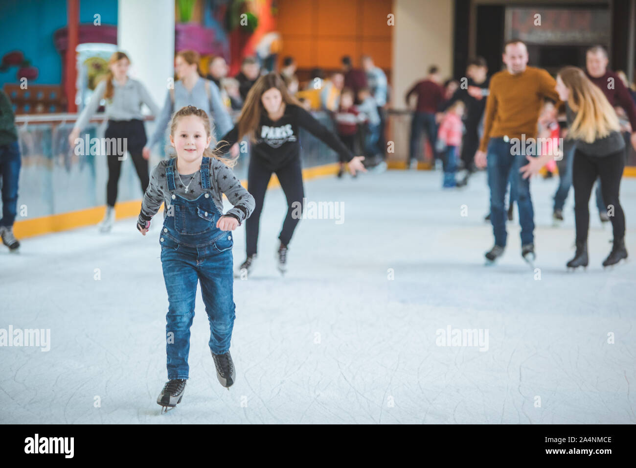 LVIV, UKRAINE - February 3, 2019: people skating on ski rink in city ...
