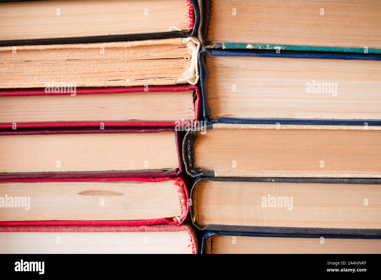 stack of old books binding to each other Stock Photo - Alamy