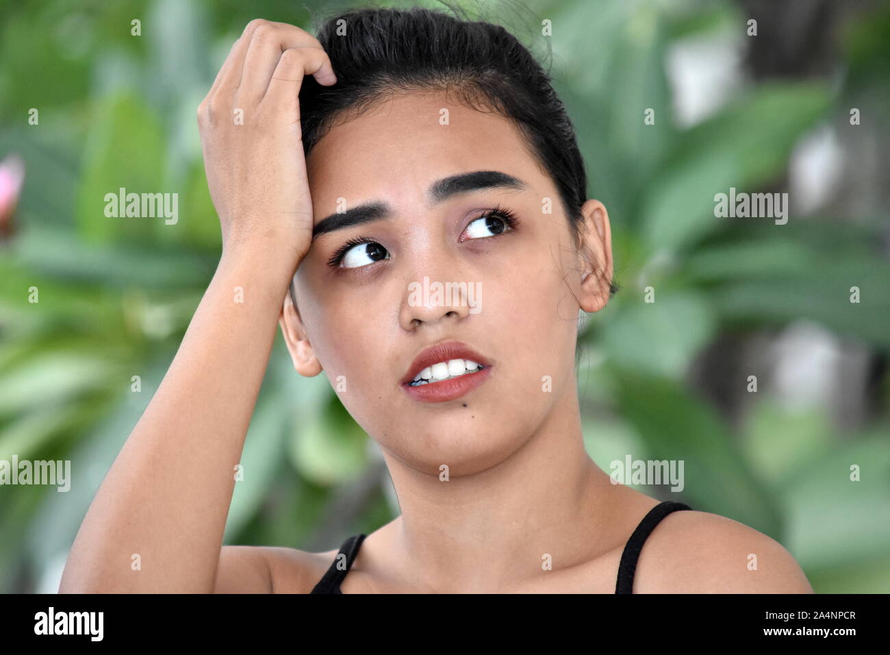 Teenage Female And Confusion Stock Photo - Alamy