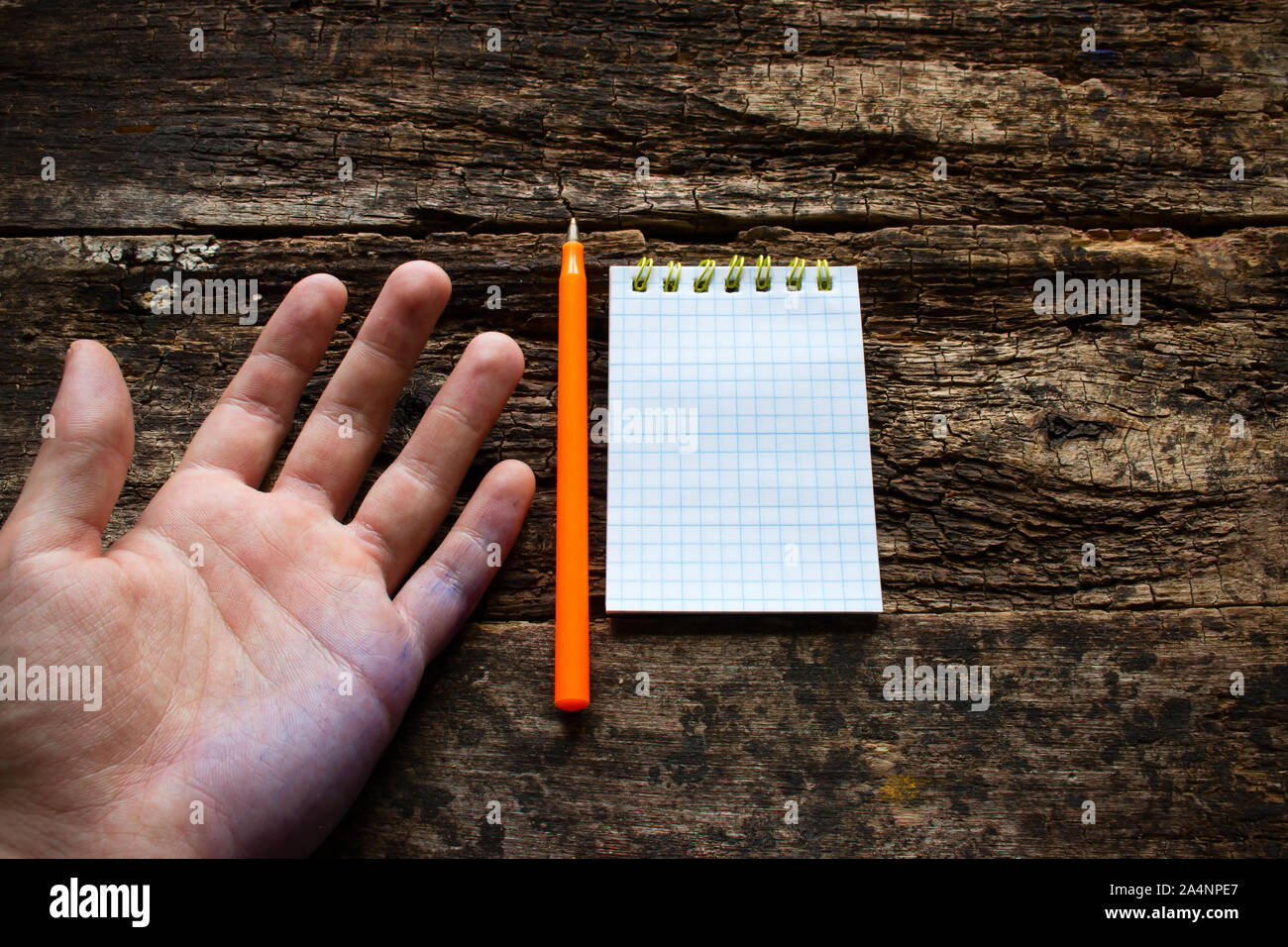 man shows the problem lefties dirty hand after writing International ...