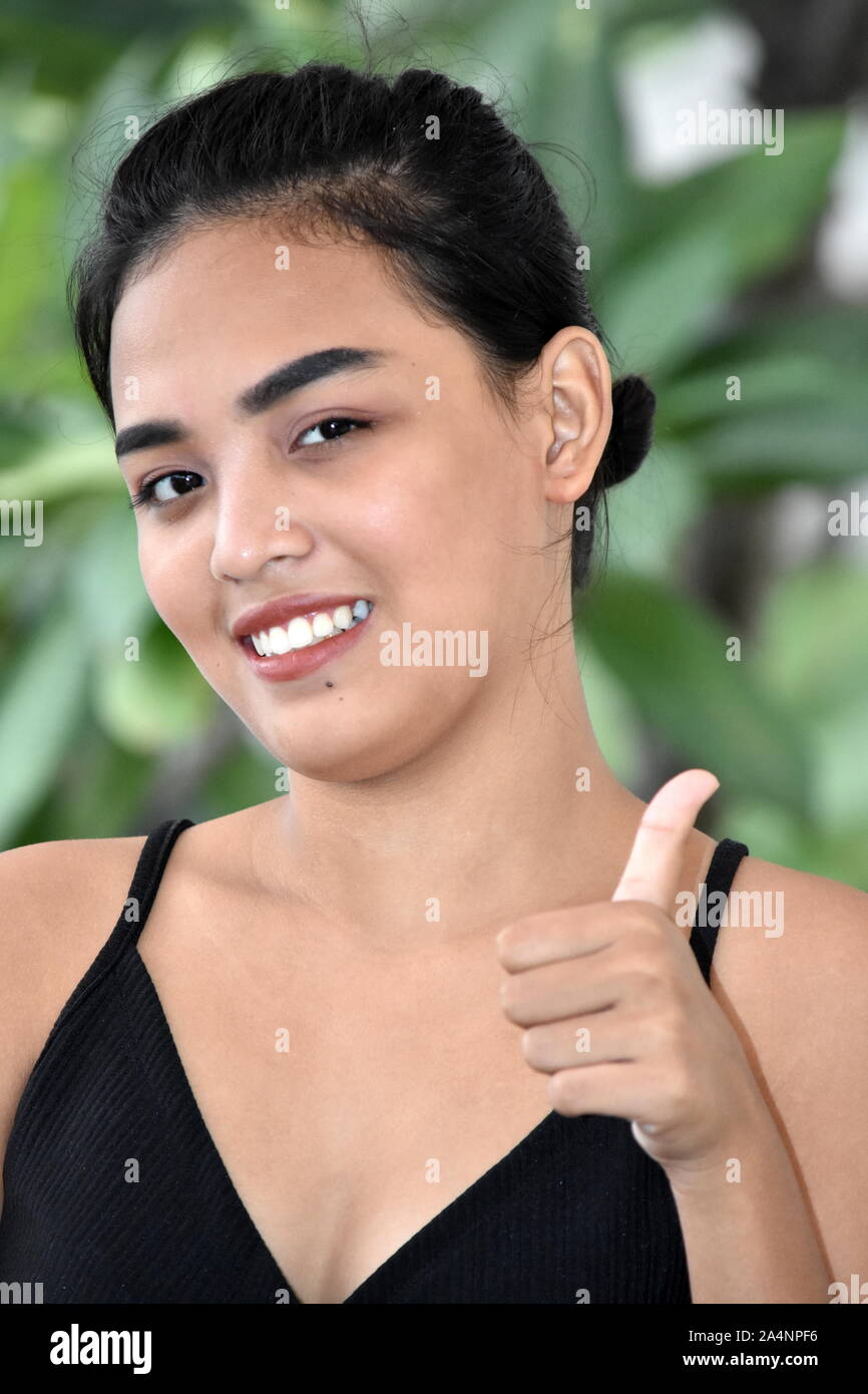 Female With Thumbs Up Stock Photo - Alamy