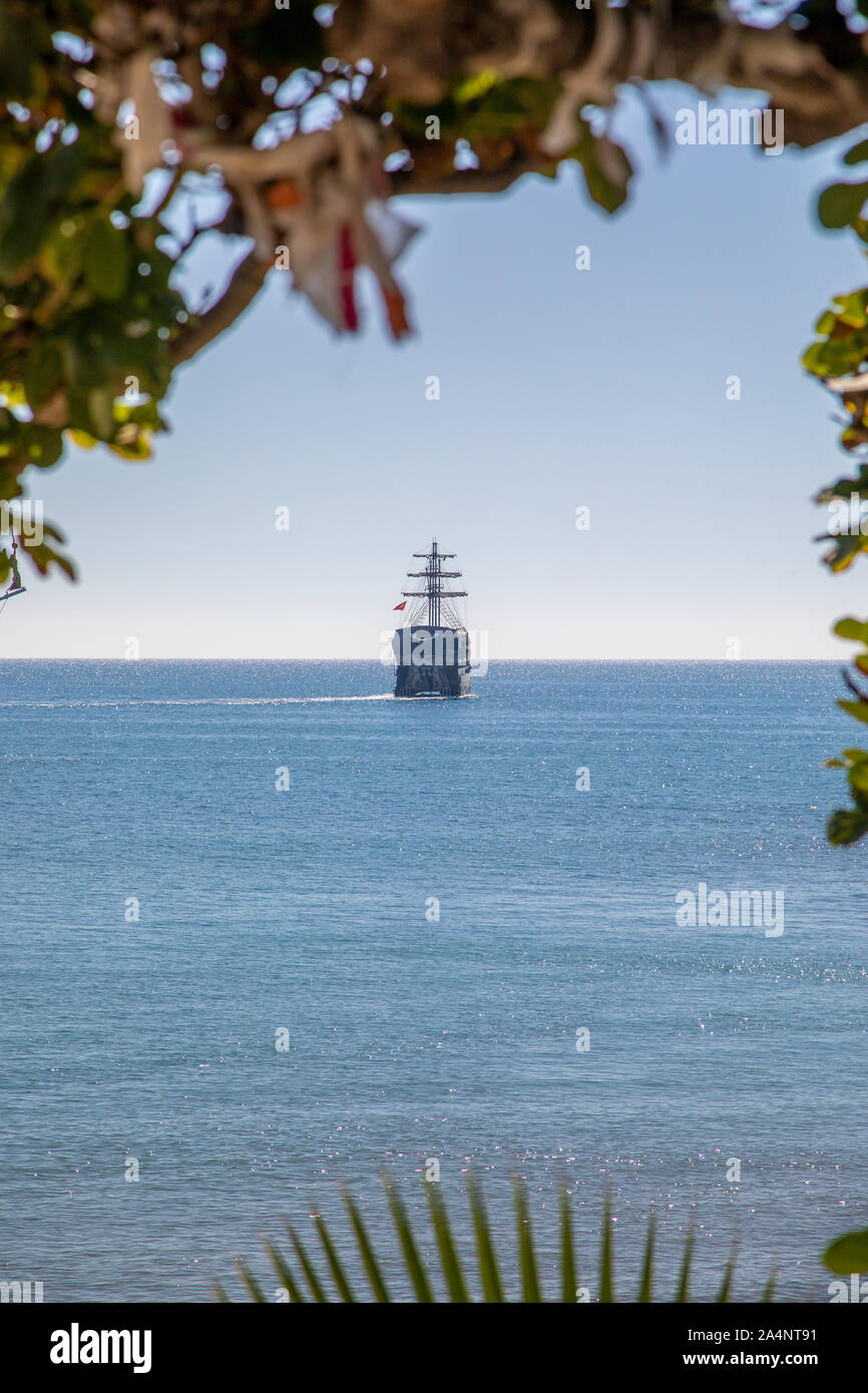 a sailing ship anchors in the port of Side in fine weather Stock Photo ...