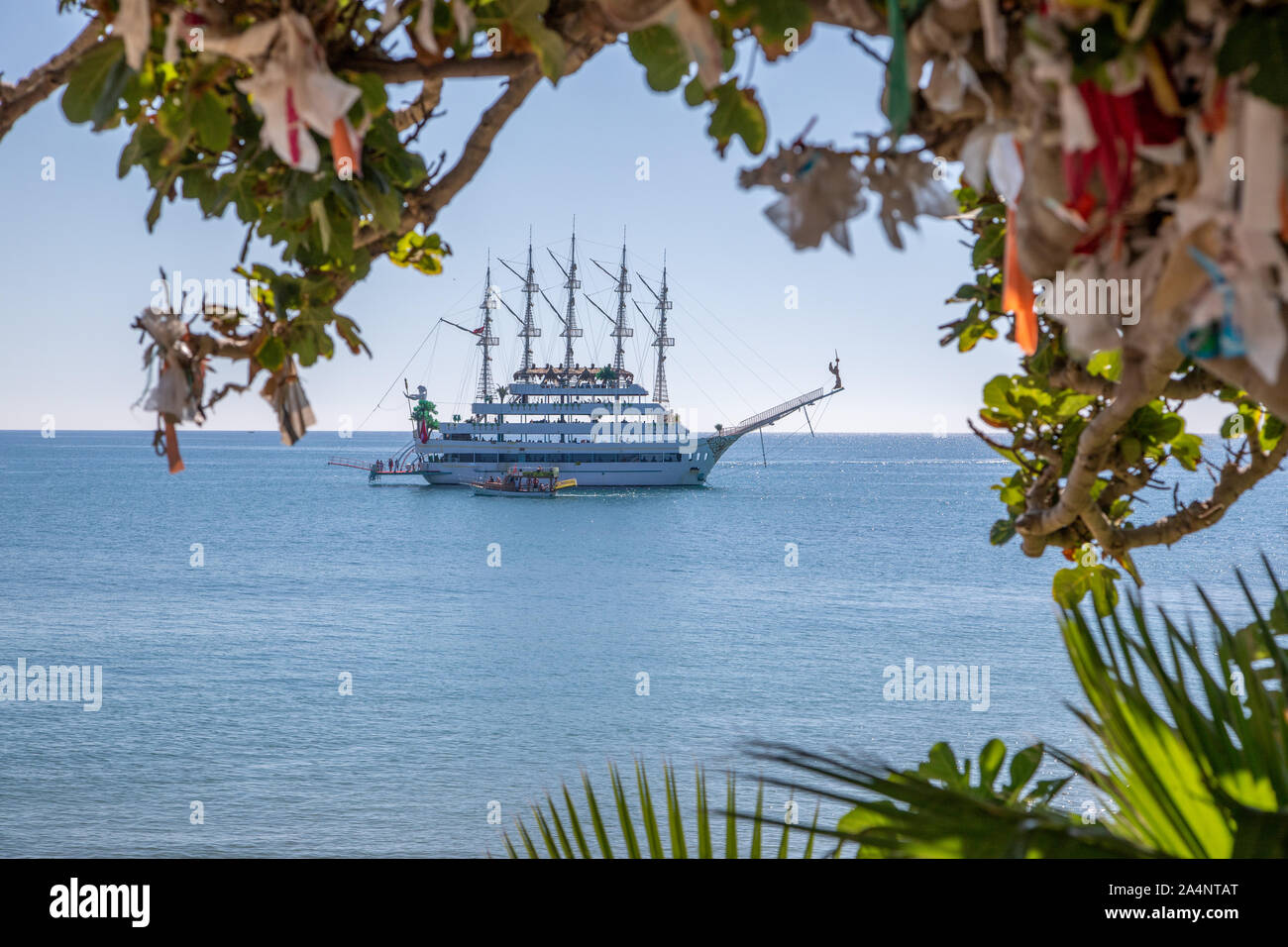 a sailing ship anchors in the port of Side in fine weather Stock Photo ...
