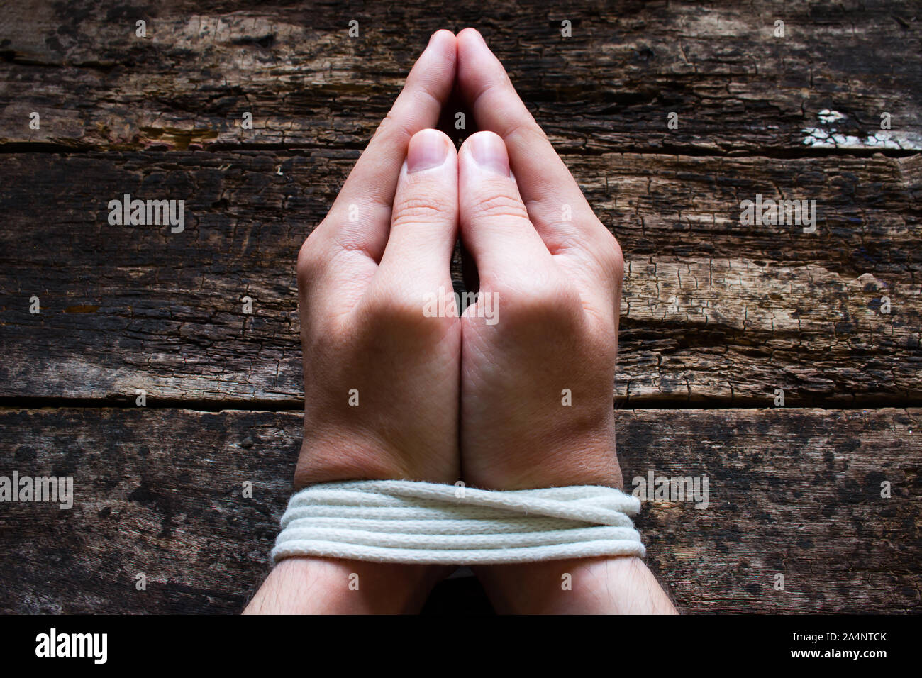 Rope handcuffs hi-res stock photography and images - Alamy