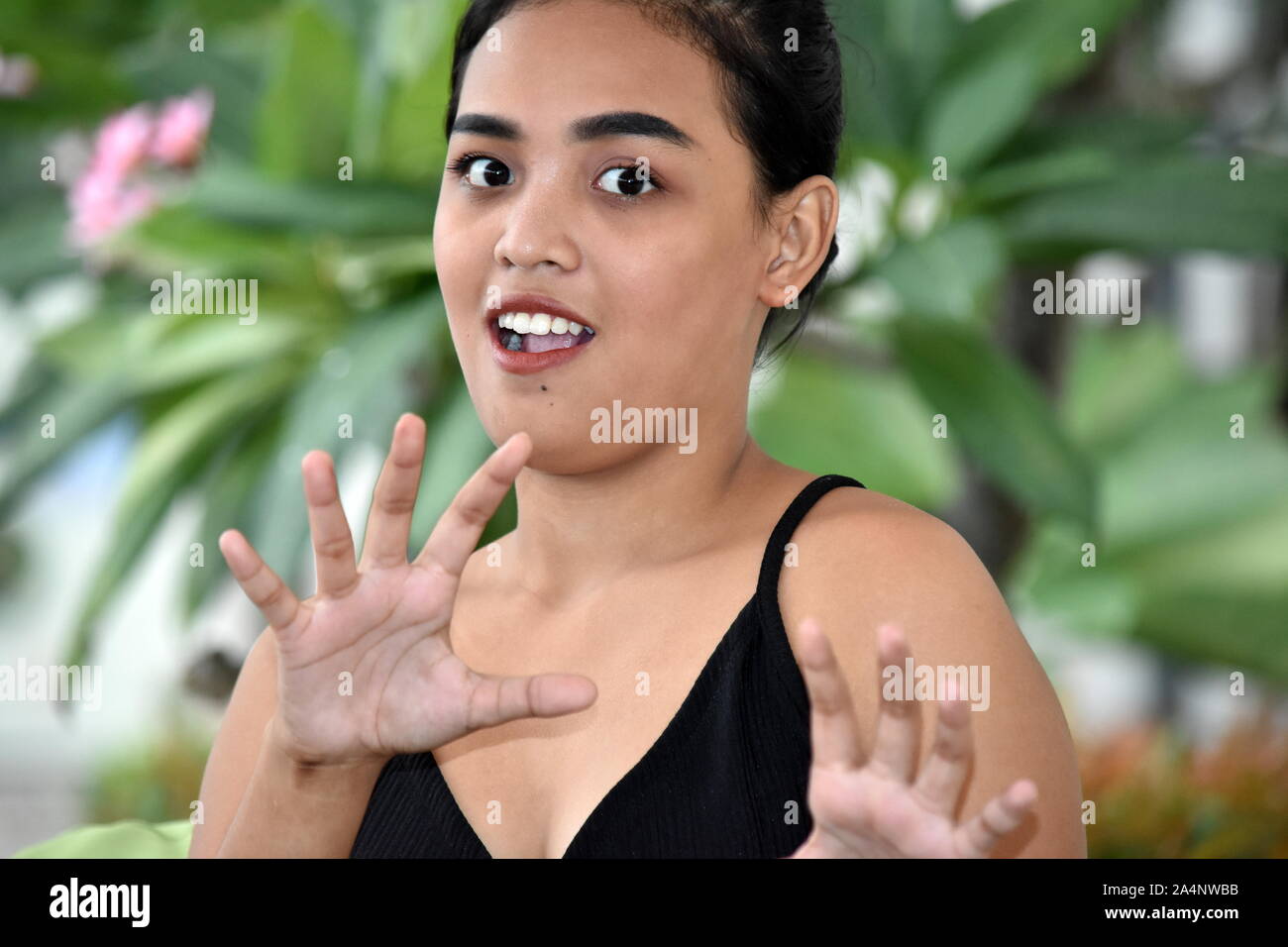 Pretty Minority Teenager Girl Afraid Stock Photo - Alamy