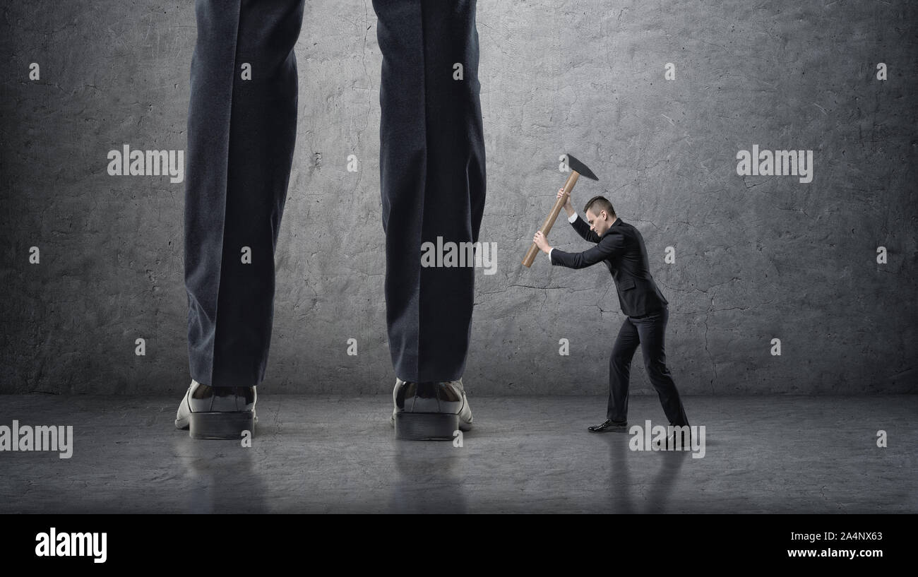 Big man little man fight hi-res stock photography and images - Alamy