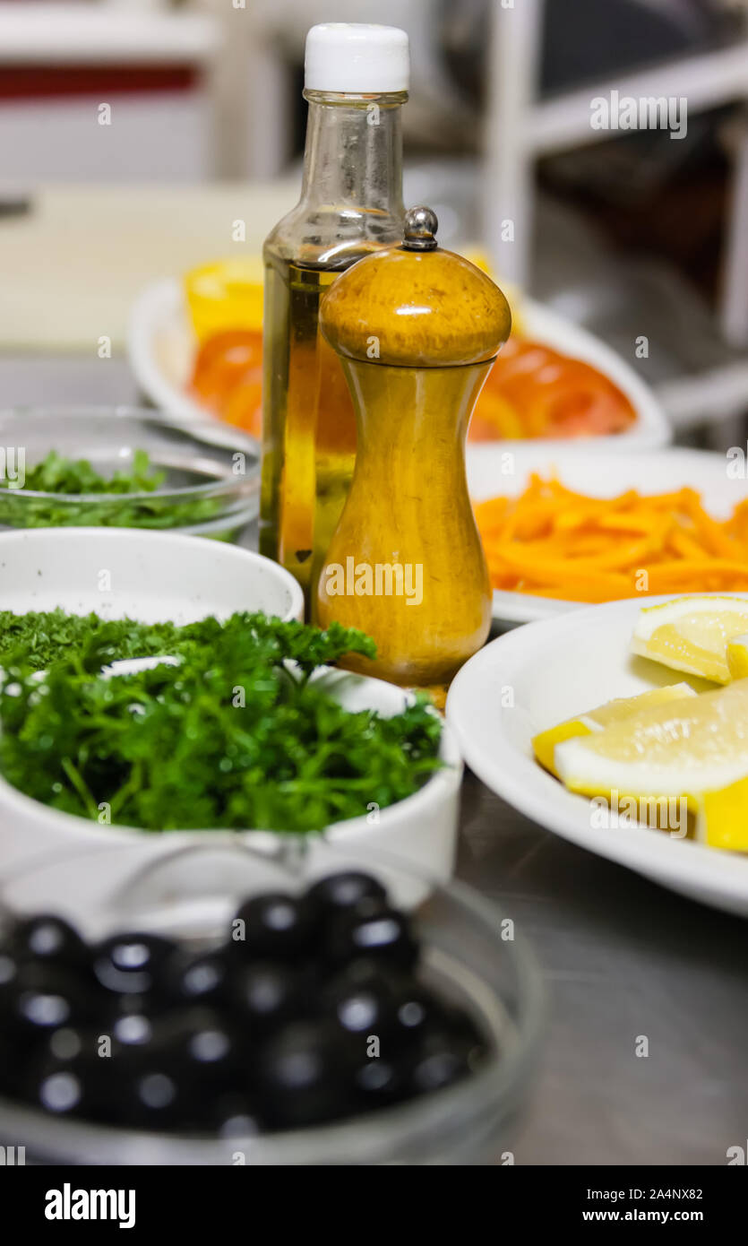 Healthy ingredients on a restaurant kitchen table, ready to go for the ...