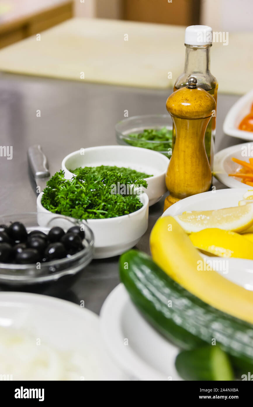 Healthy ingredients on a restaurant kitchen table, ready to go for the ...
