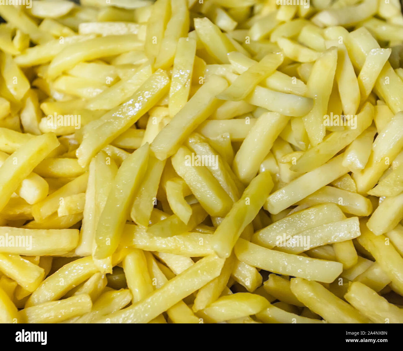 potato chips, ready to go for the cooking process Stock Photo - Alamy