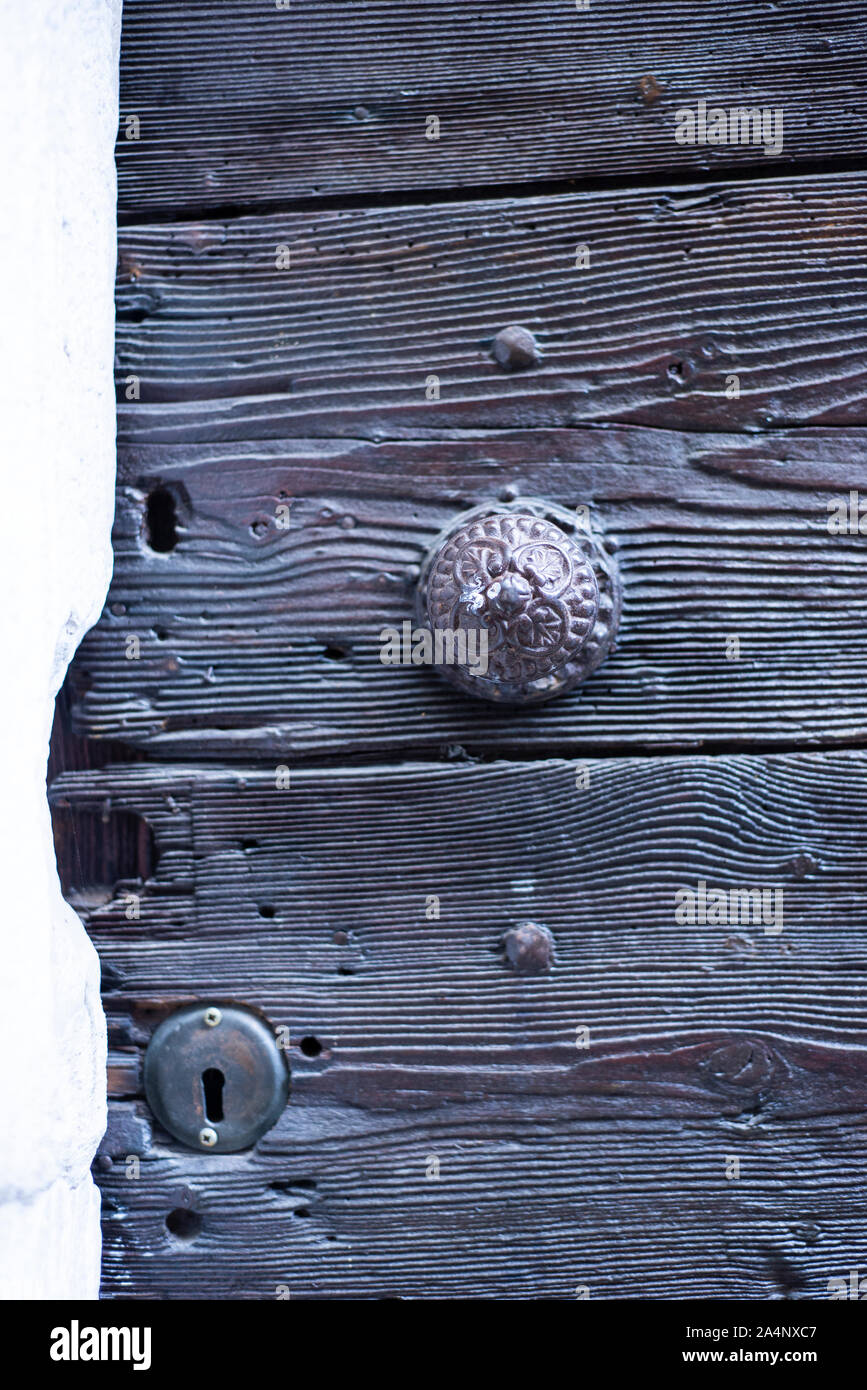 Ornamental fixture on heavy wooden door in Annecy, France Stock Photo ...