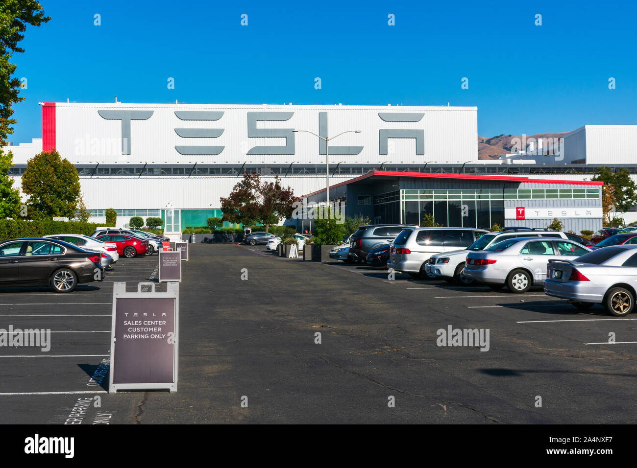 Tesla logo displayed on the exterior wall of Tesla Factory, automobile ...