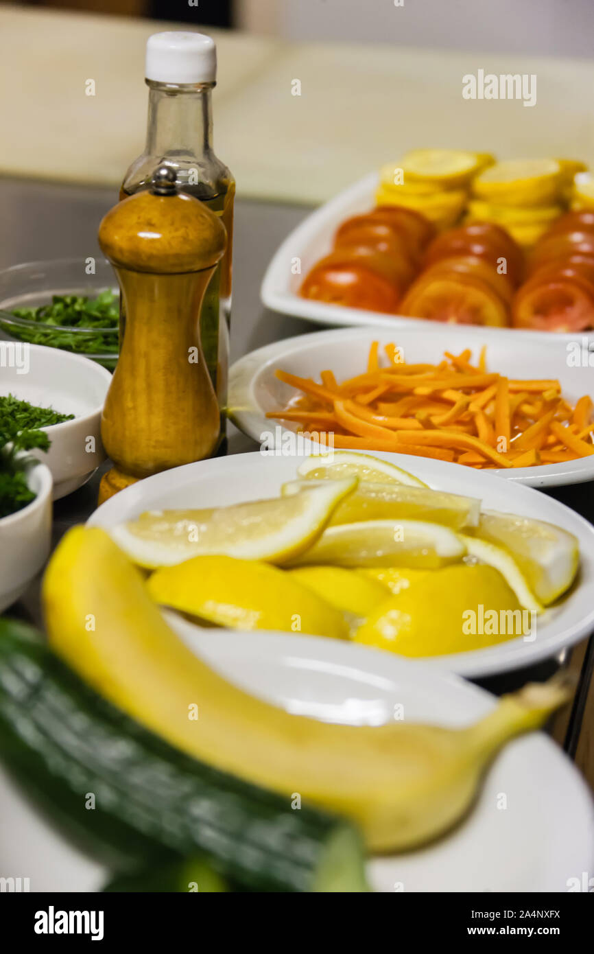Healthy ingredients on a restaurant kitchen table, ready to go for the ...