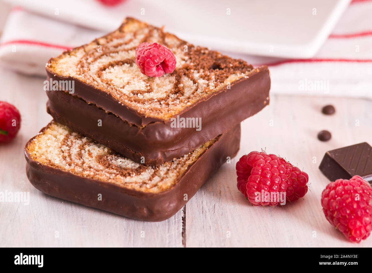 Marble cake with raspberries Stock Photo - Alamy