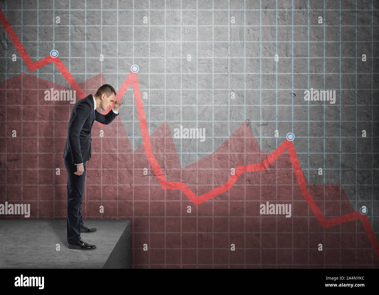 Businessman shading eyes with his hand looking at falling diagram Stock ...