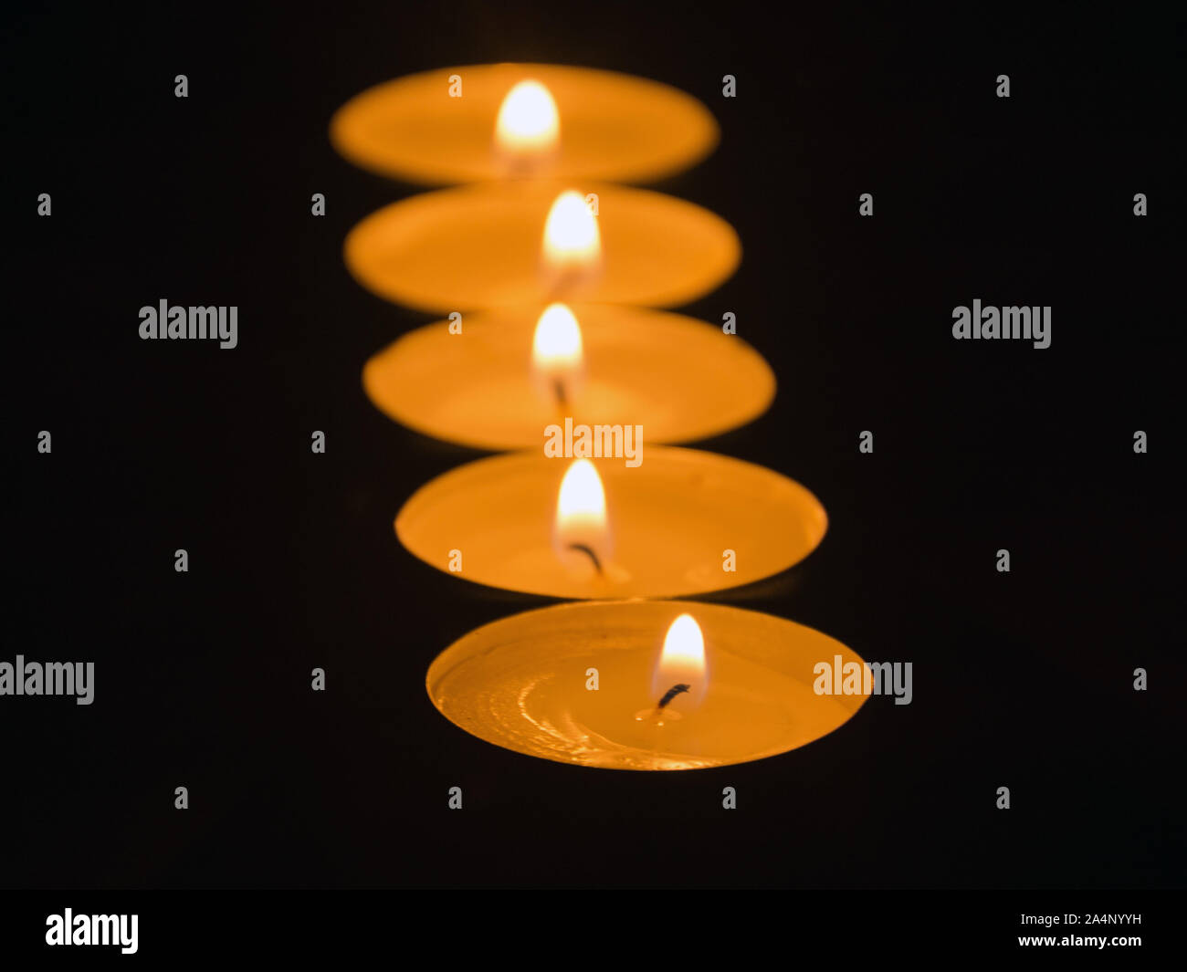 Candle fire burn flame glow light hi-res stock photography and images ...
