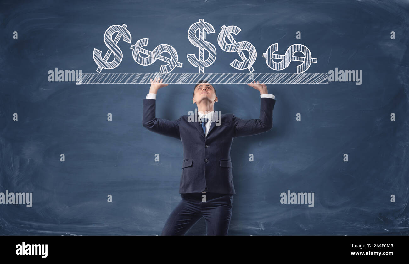 Businessman pushing dollar sign hi-res stock photography and images - Alamy