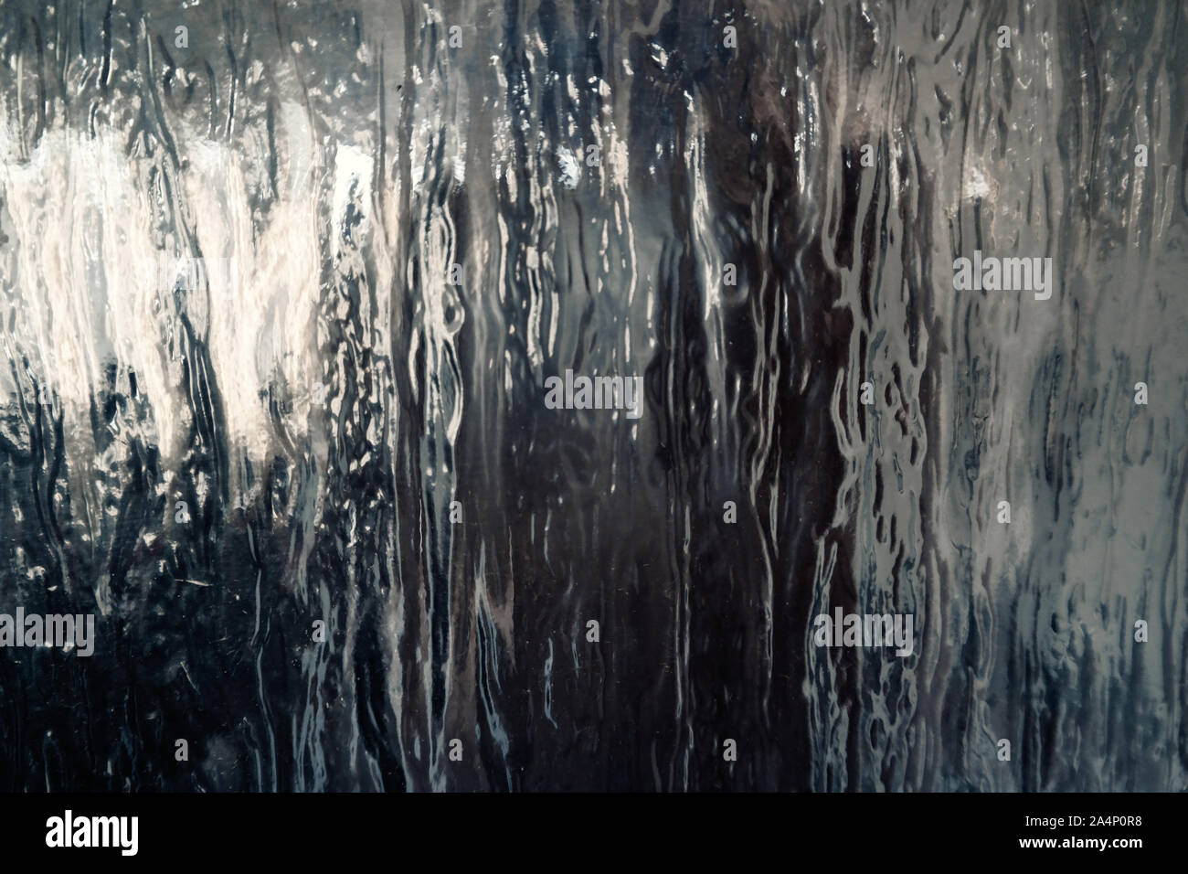 Dark reflection in textured glass Stock Photo - Alamy