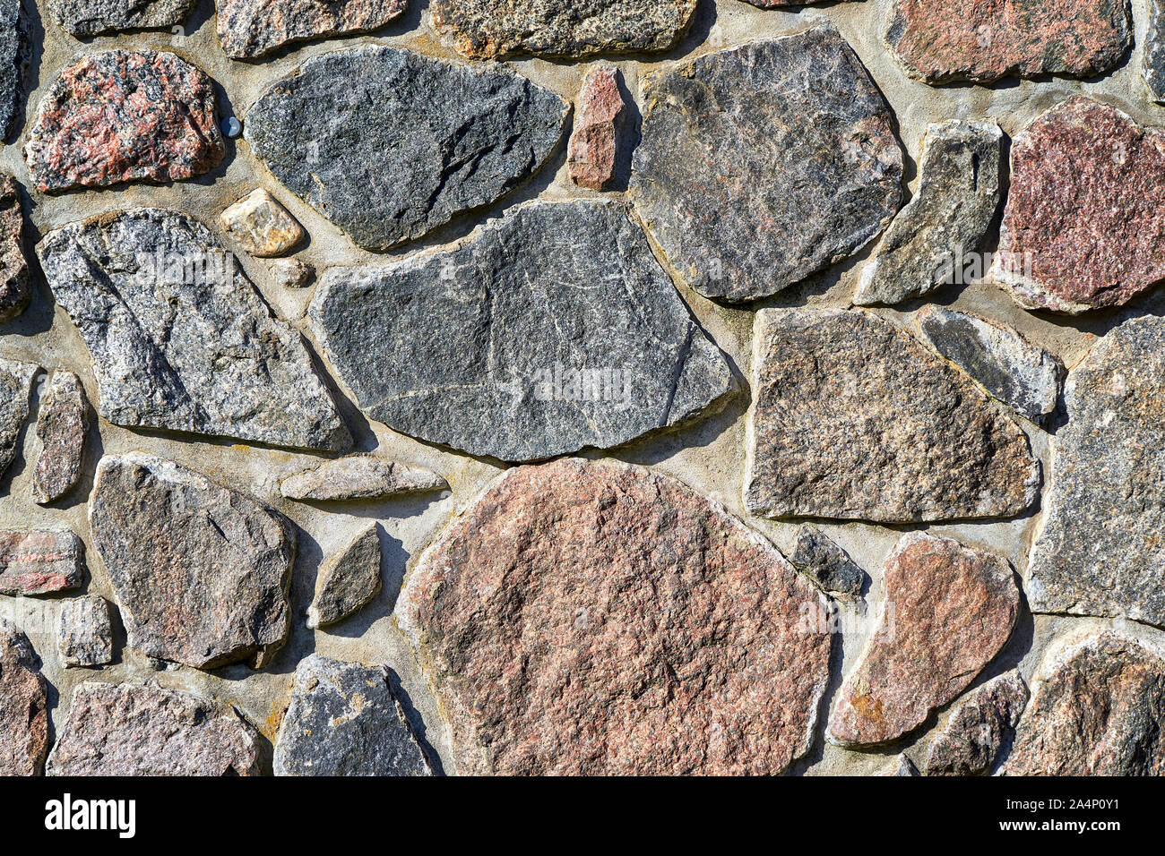 Medieval stone wall as a background Stock Photo - Alamy