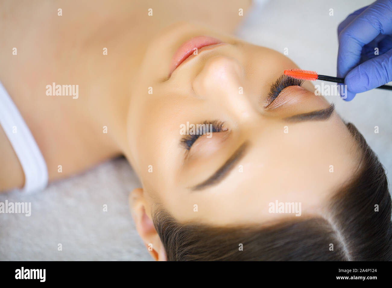 Beauty concept. Eyelash extension process Stock Photo - Alamy