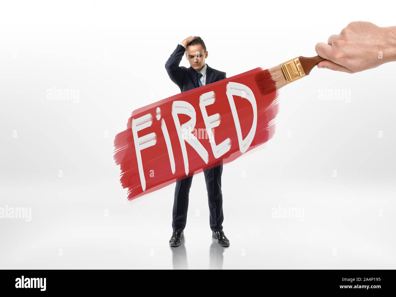 Hand drawing red line with sign 'fired' over the businessman Stock ...
