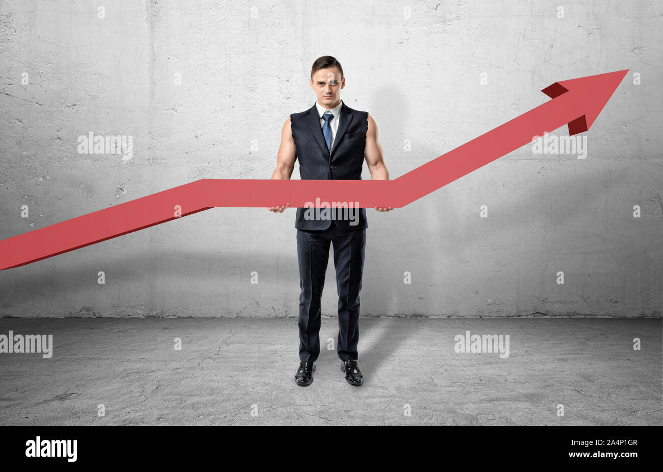 Businessman having muscular arms and holding big red line graph with an ...