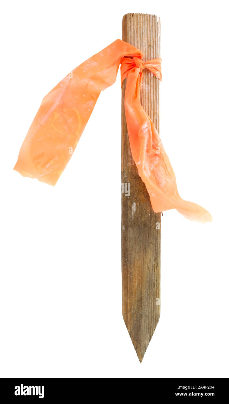 Isolated wooden construction stake with orange flag. Vertical Stock ...
