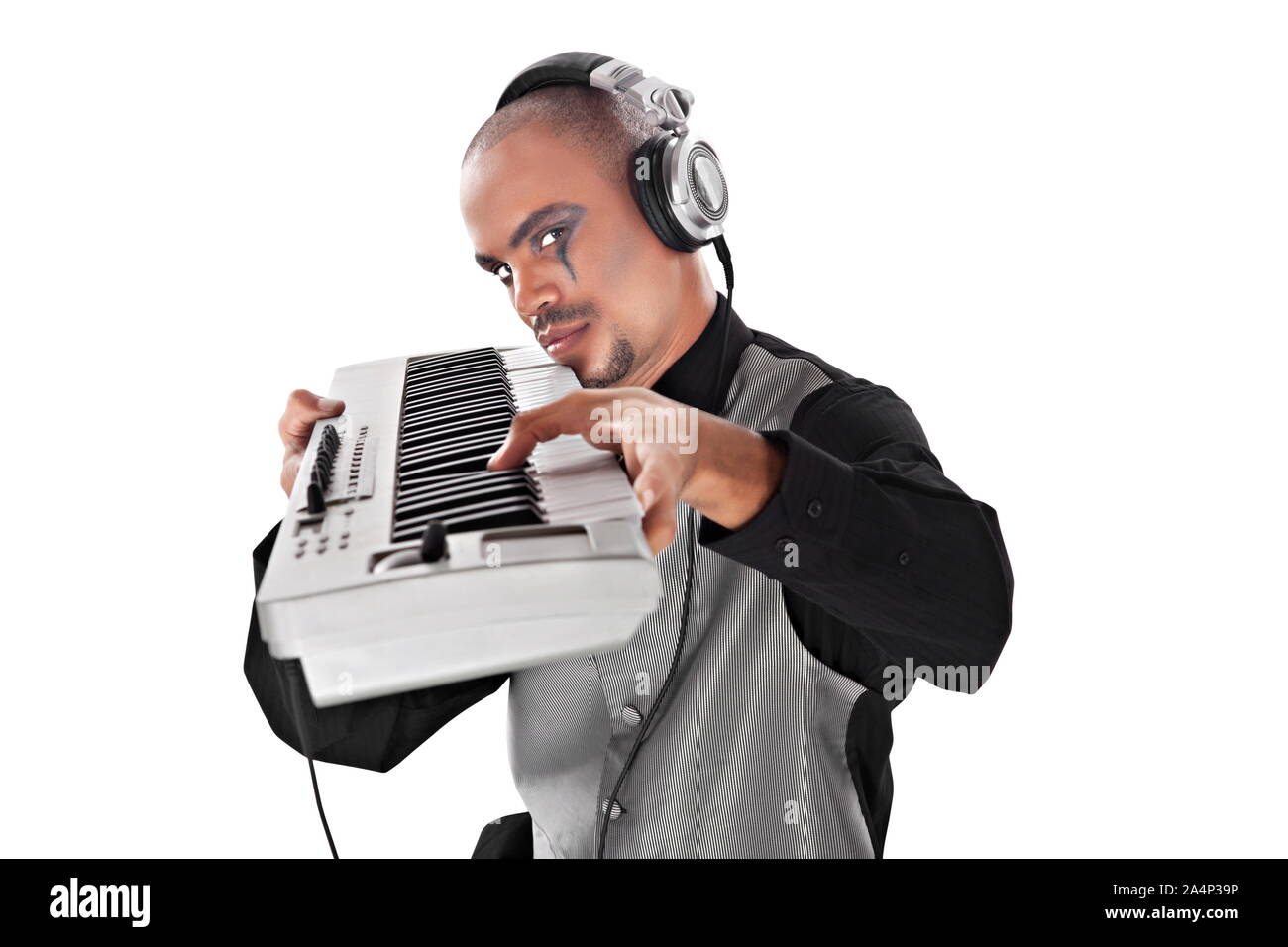 African musician singer with headphones holding a keyboard Stock Photo ...