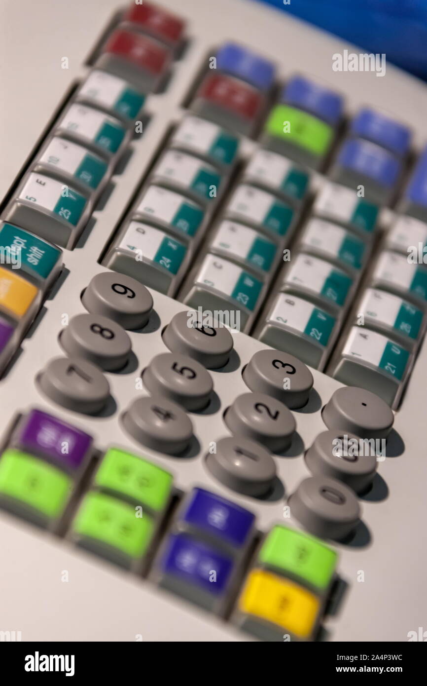 cash register, with gray keypad and multi color buttons Stock Photo - Alamy