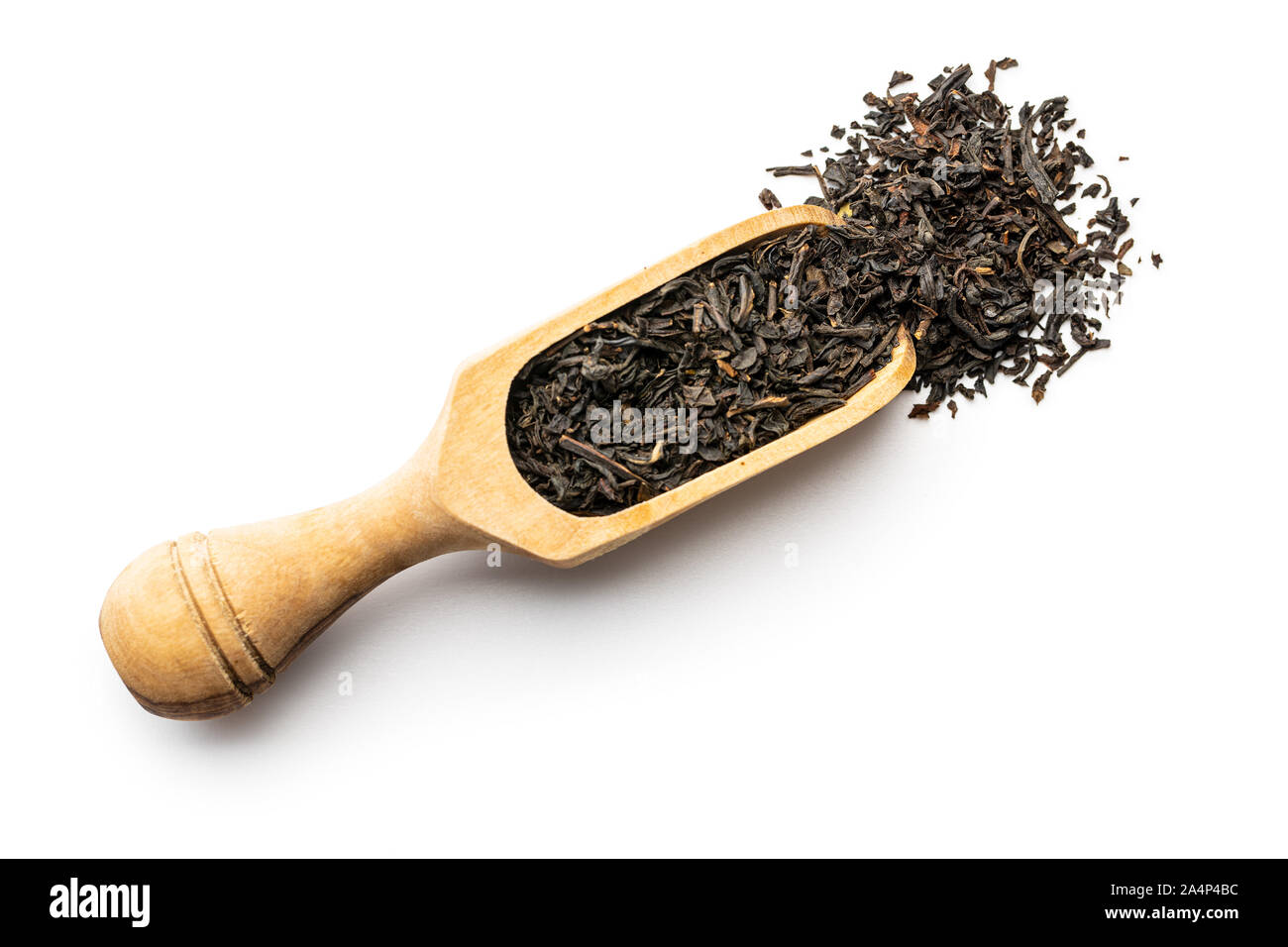 Dried black tea leaves in scoop isolated on white background Stock ...