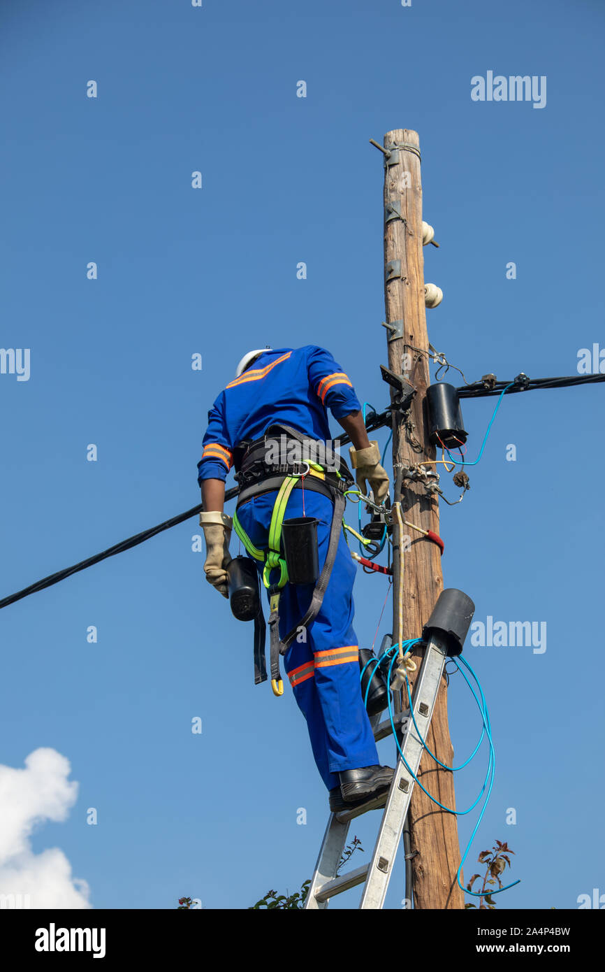 Worker pole hi-res stock photography and images - Alamy