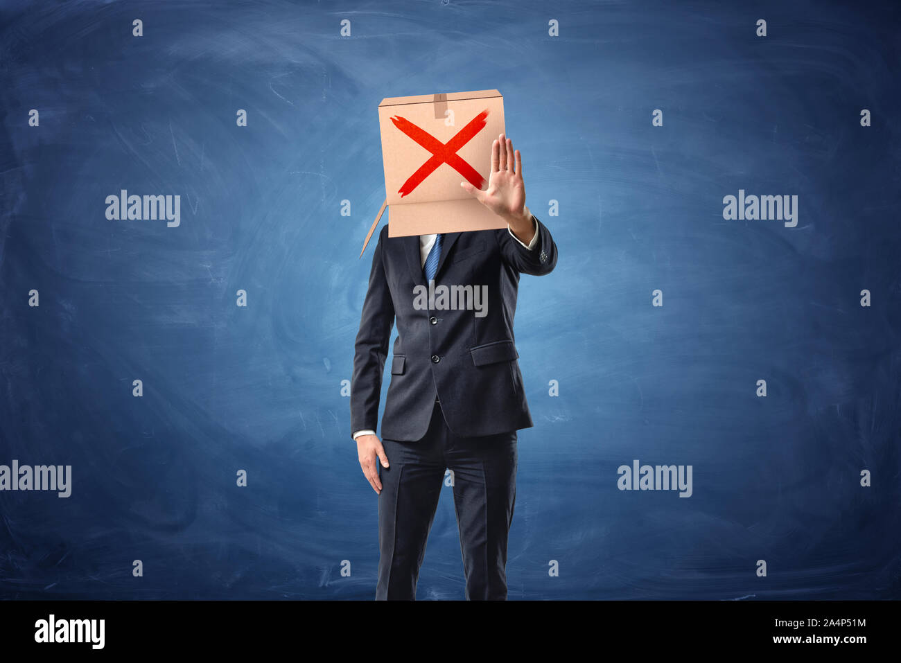 Businessman is wearing cardboard box with drawn red cross sign Stock ...