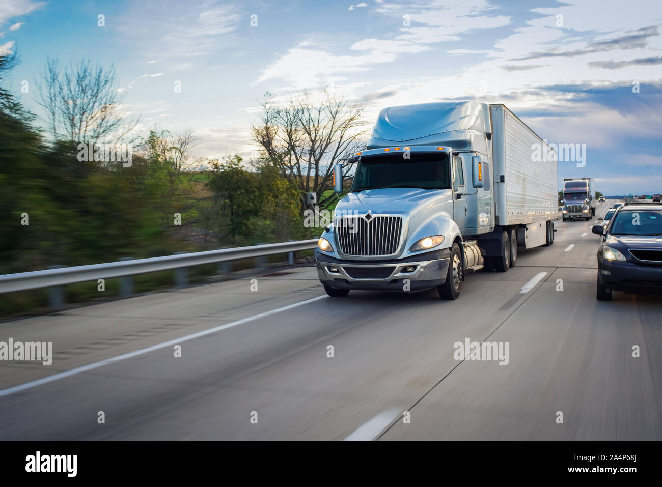 Blue 18 wheeler semi truck tractor trailer on the highway road Stock ...