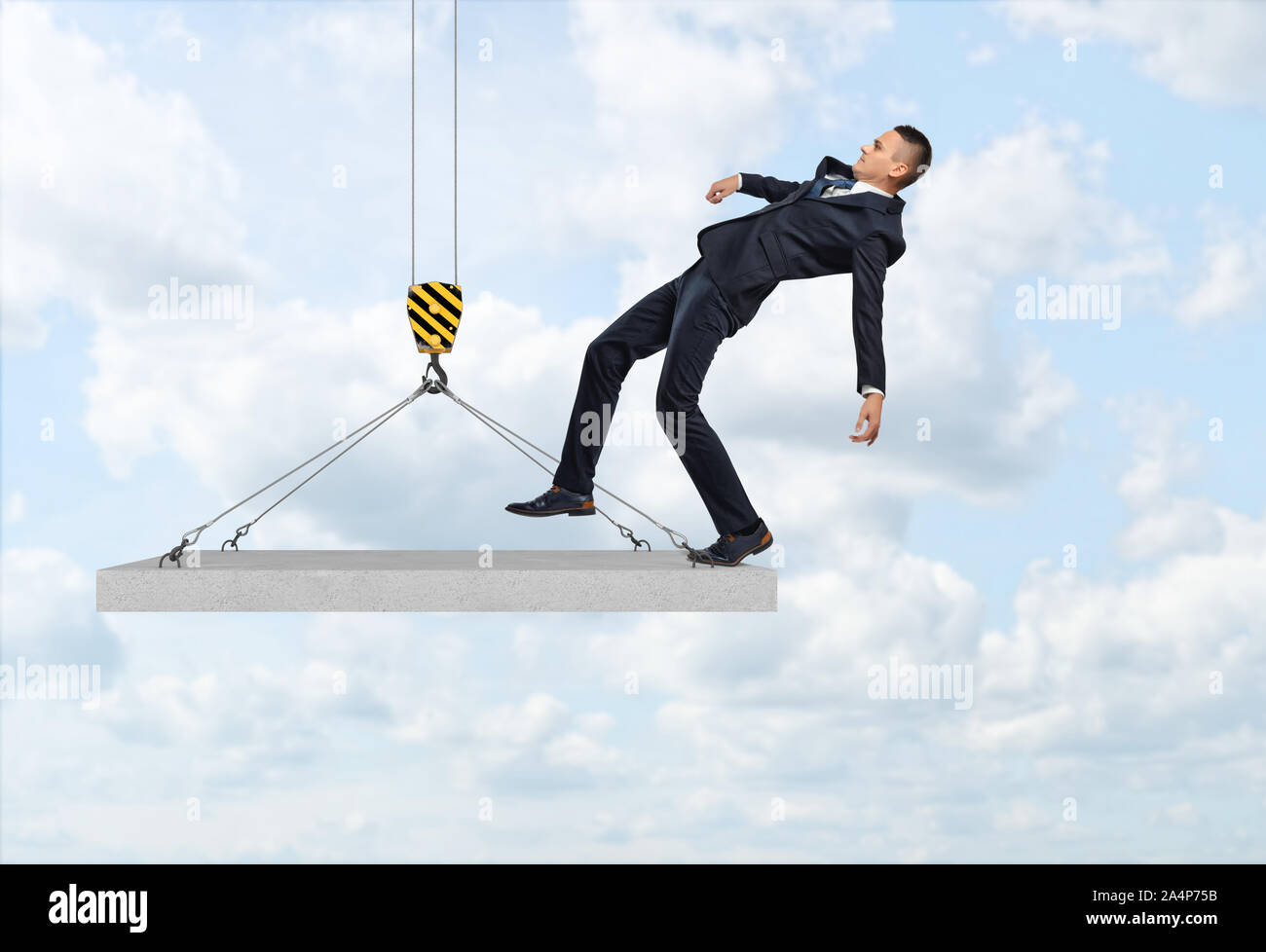 Businessman falling from the concrete slab suspended on the ...
