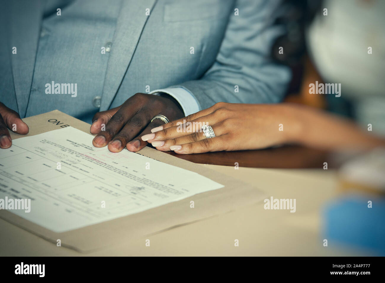 Hands holding paper certificate hi-res stock photography and images - Alamy