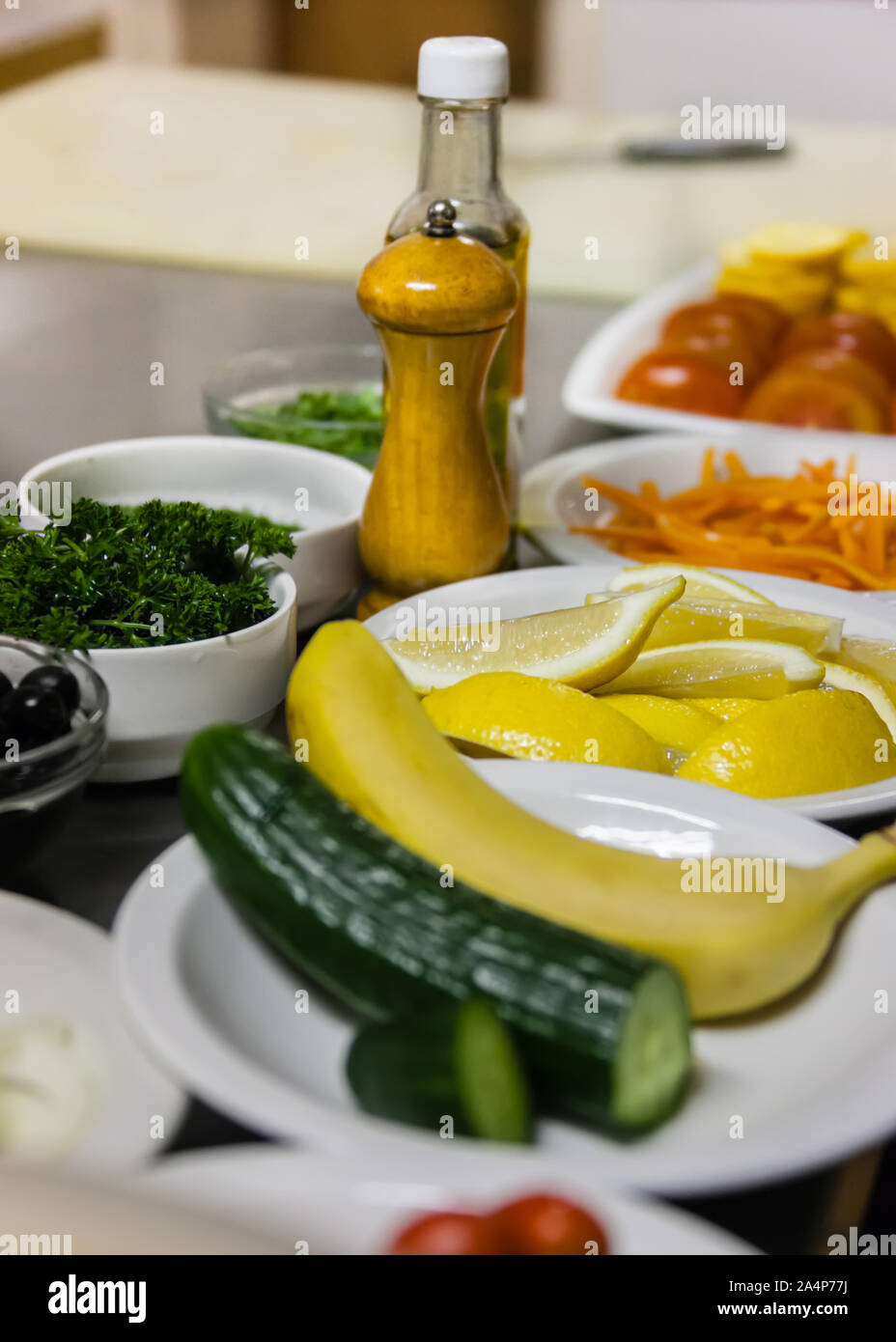 Healthy ingredients on a restaurant kitchen table, ready to go for the ...