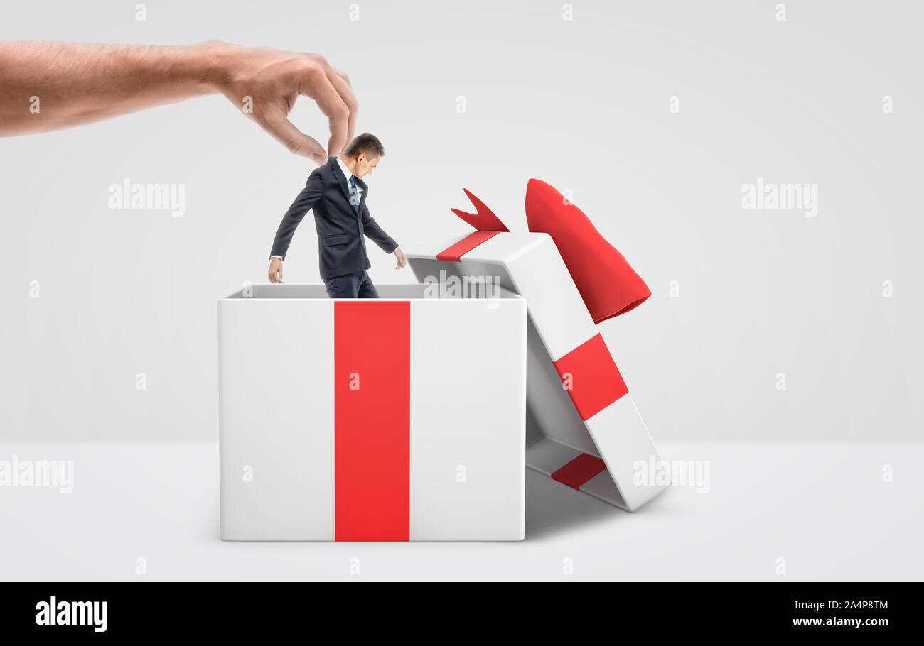 Man reaching into box hi-res stock photography and images - Alamy