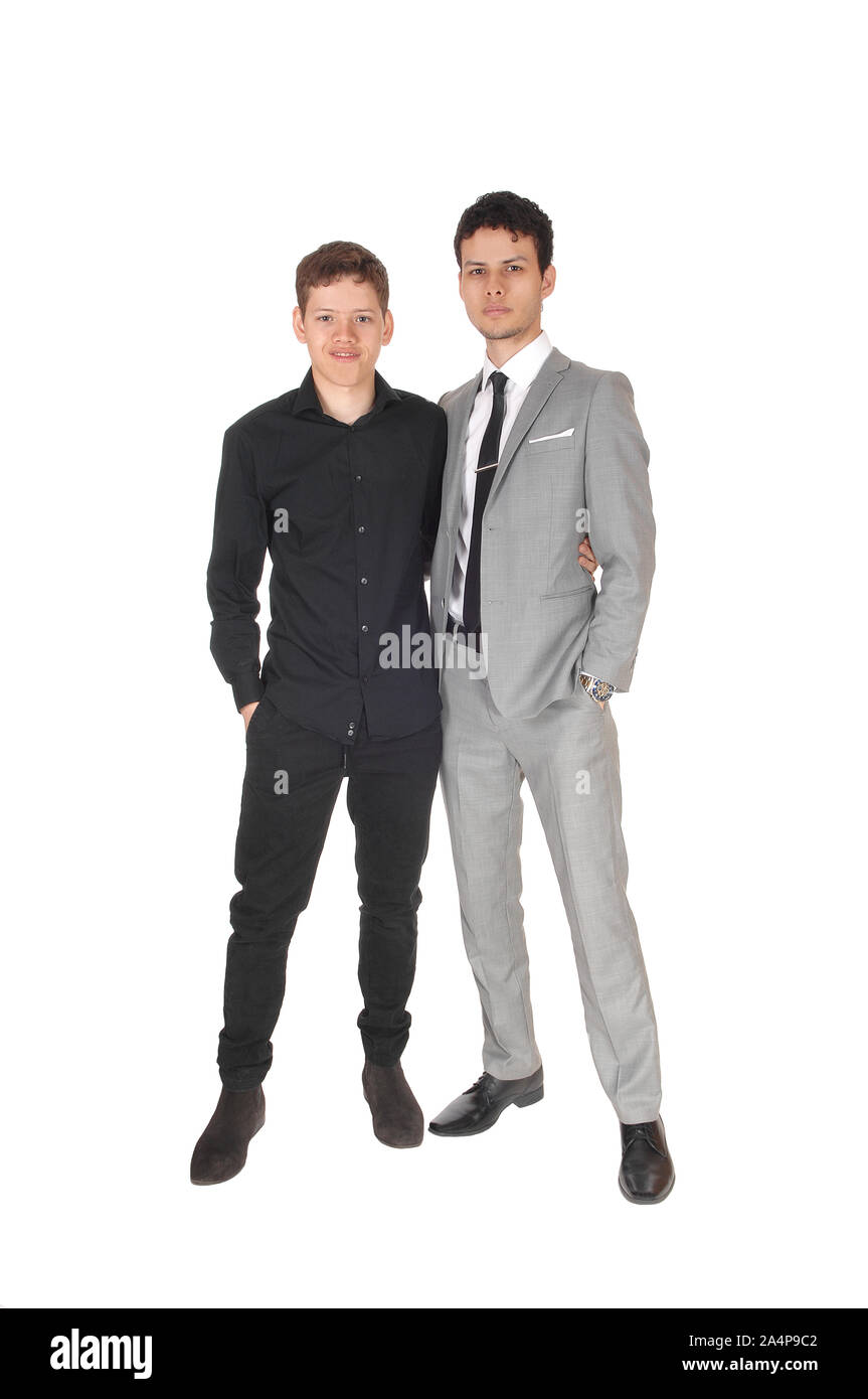Two brothers, one in a gray suit, the other one in black outfit ...