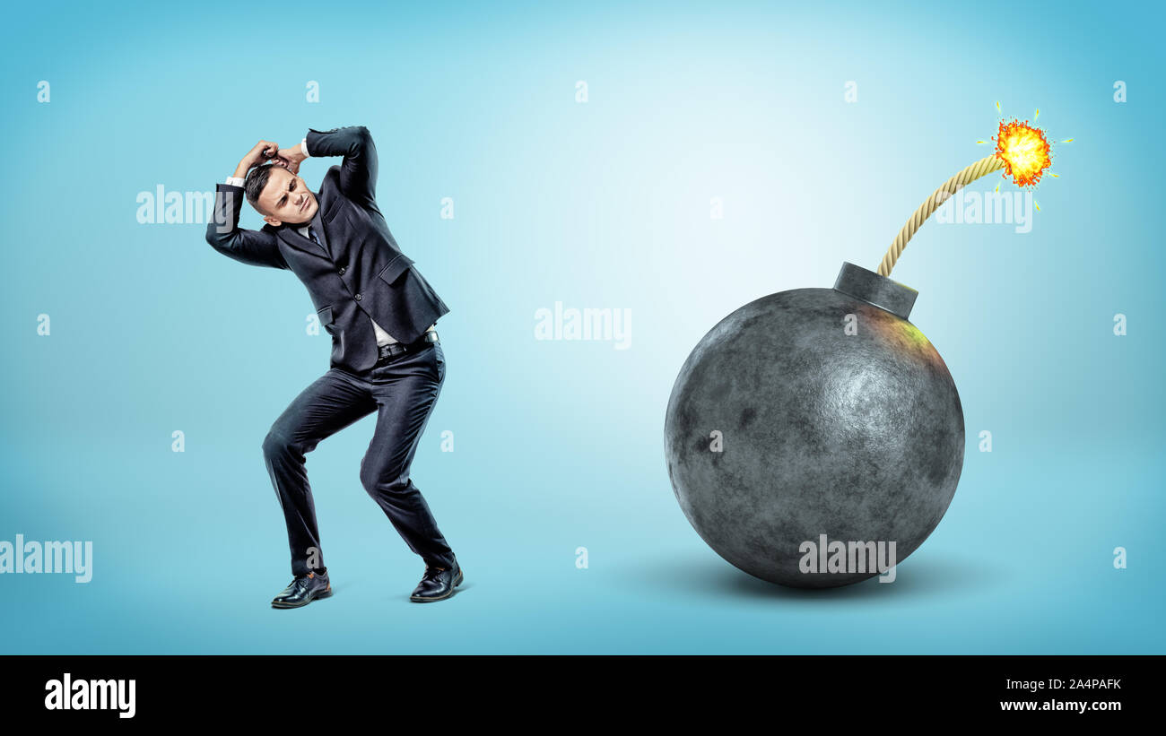 Scared businessman hi-res stock photography and images - Alamy