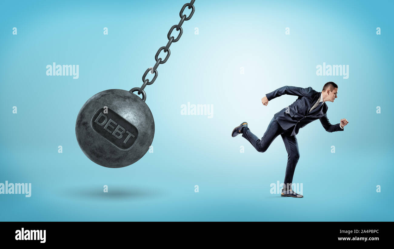 Ball and chain debt hi-res stock photography and images - Alamy