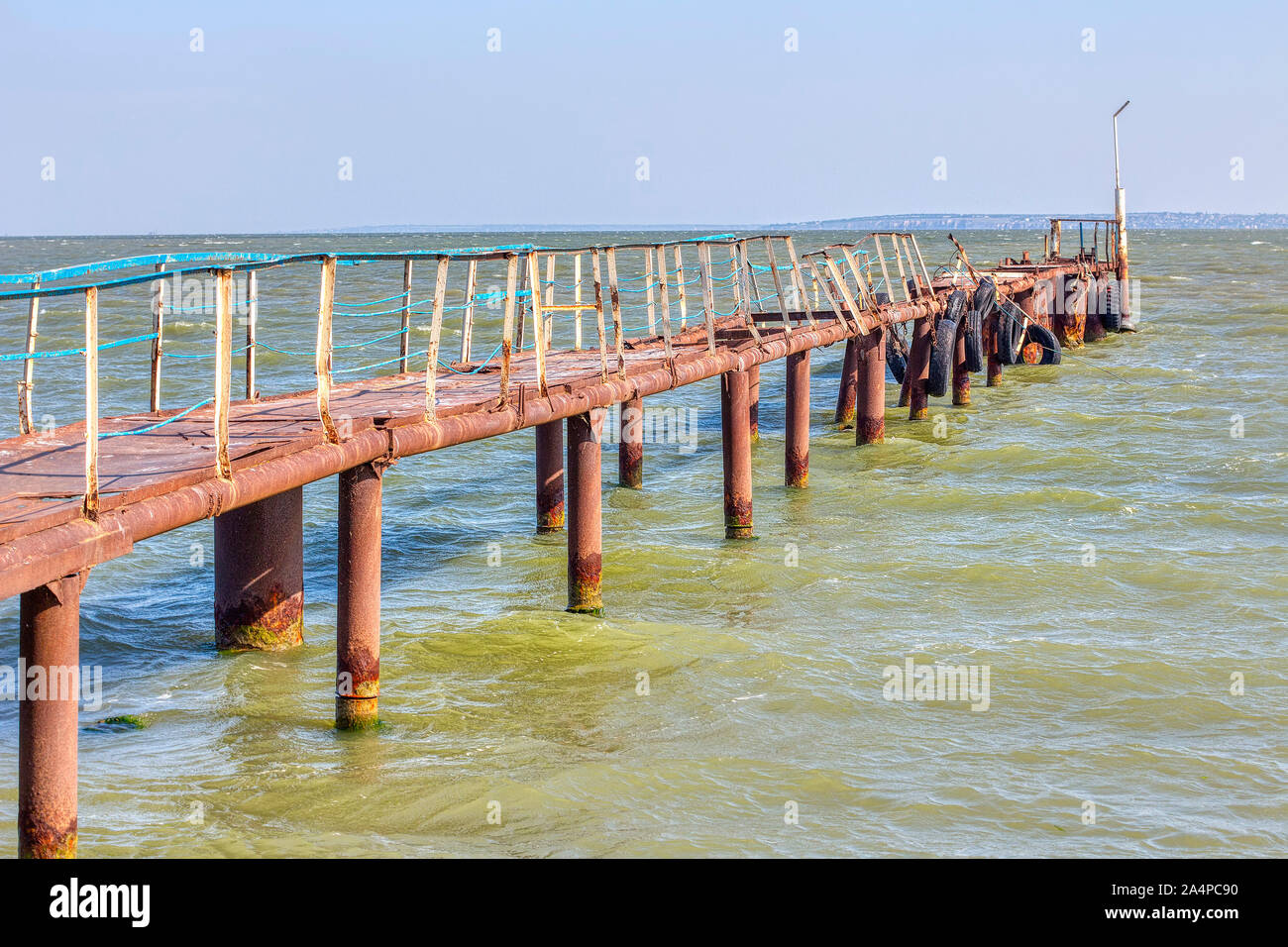 old pier with rusty pillars Stock Photo - Alamy
