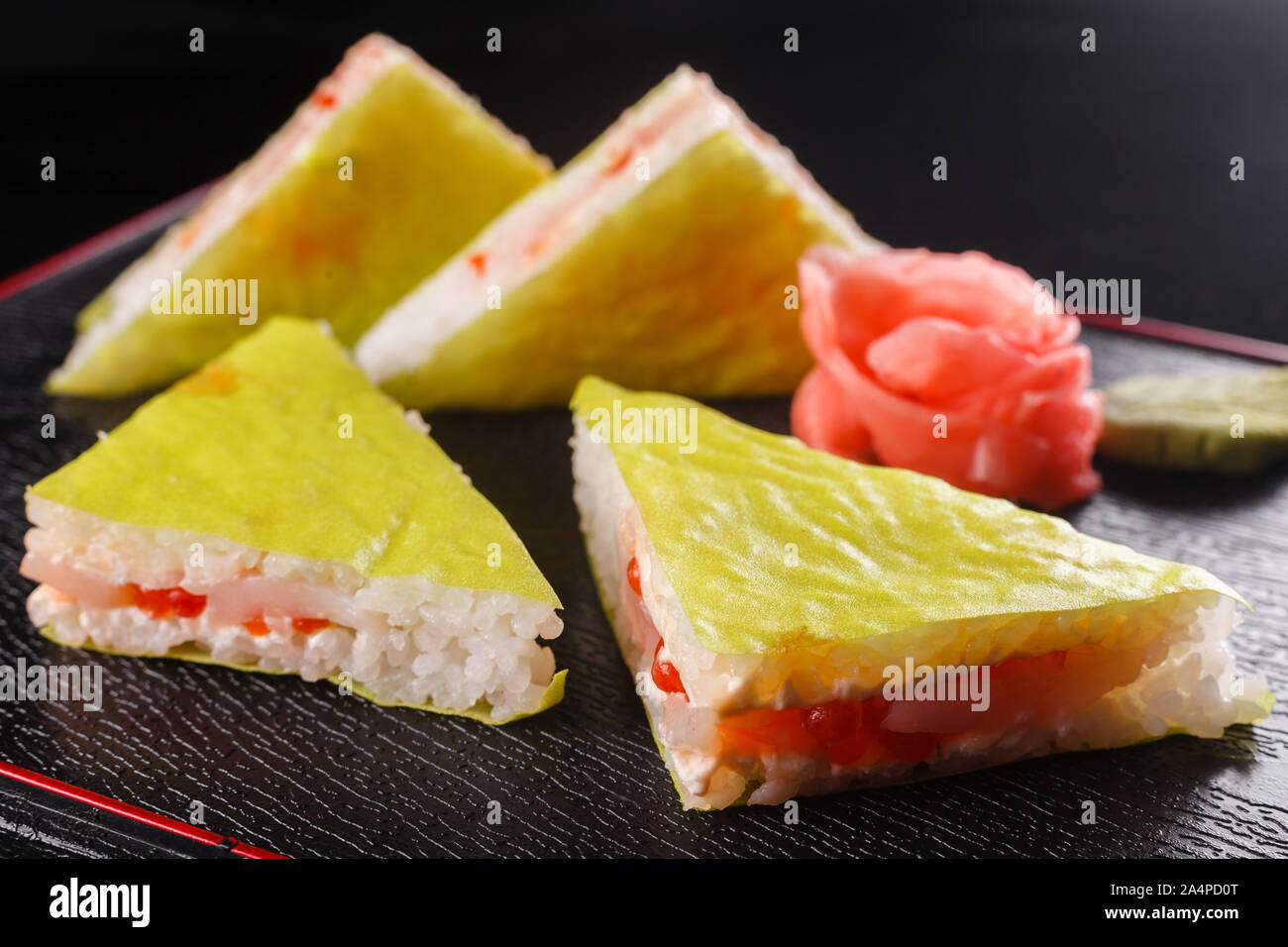 Triangular pieces. Japanese food, tasty of meal for lunch. Seafood ...