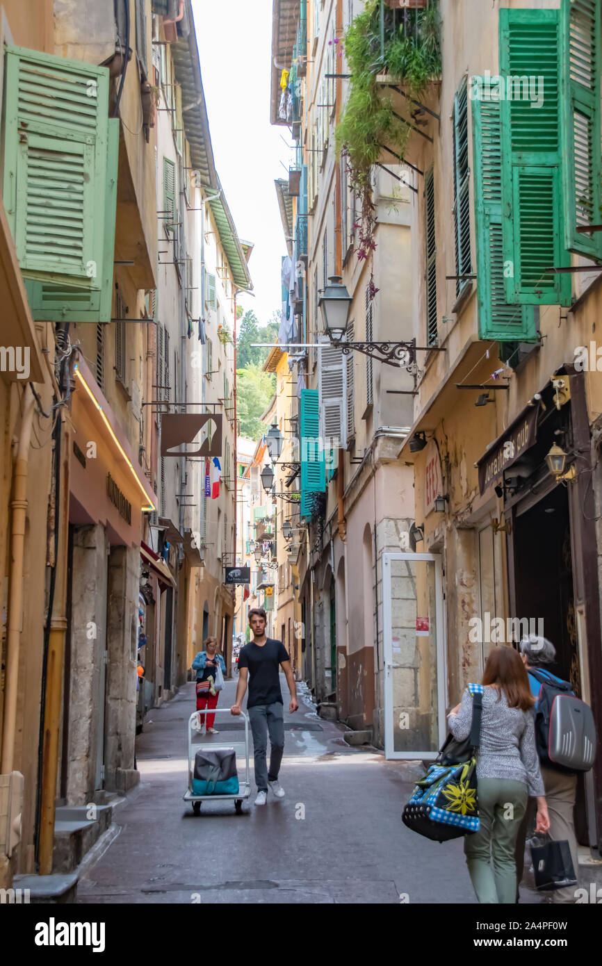 Nice, France - October 6, 2018: Colorful alley in the old town of Nice ...