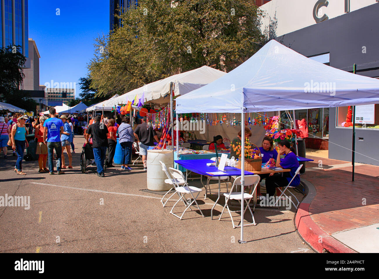 People attending the popular Tucson Meet Yourself Festival on a ...