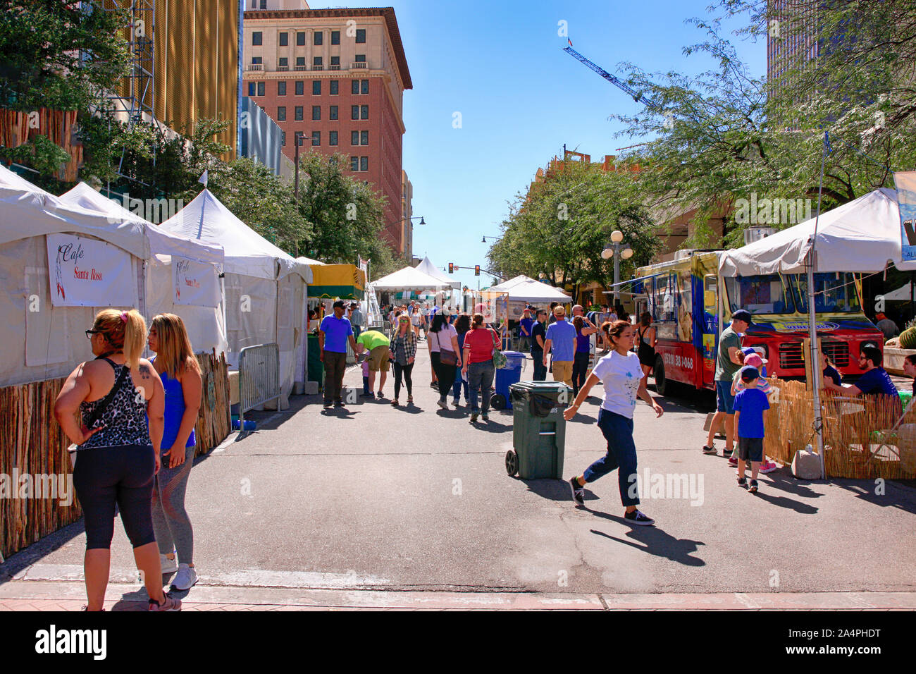People attending the popular Tucson Meet Yourself Festival on a ...