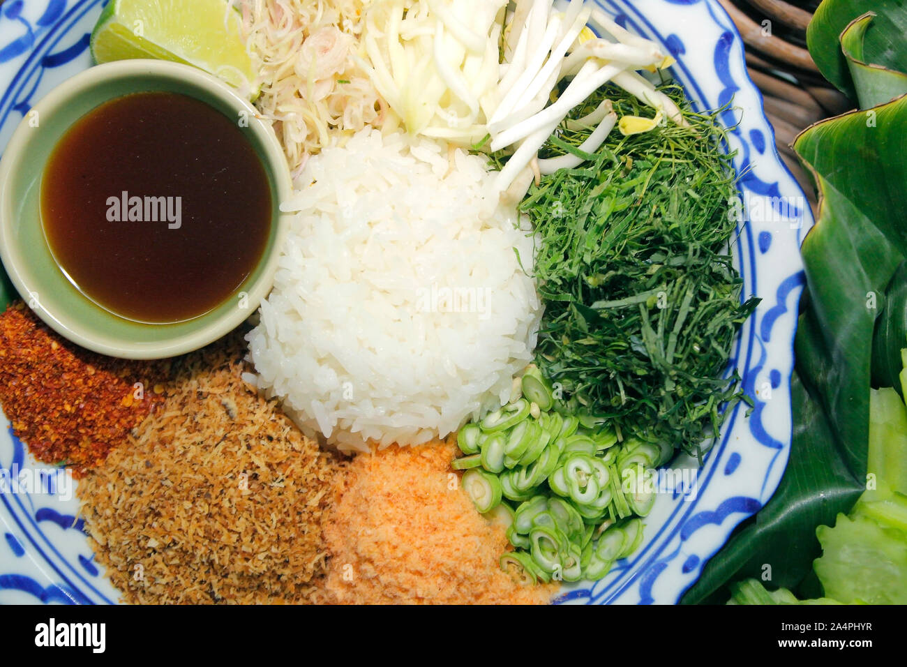Thai cuisine khao yam, Thai southern spicy rice salad with vegetables ...