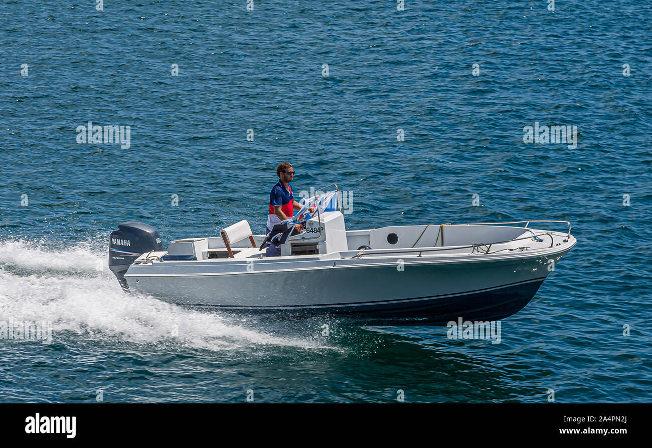 Man in Yamaha Speedboat Stock Photo - Alamy