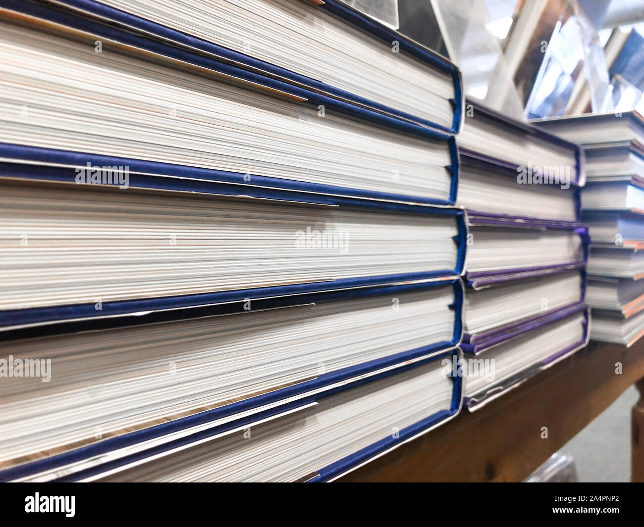 Close up stack of books at the bookstore or library Stock Photo - Alamy