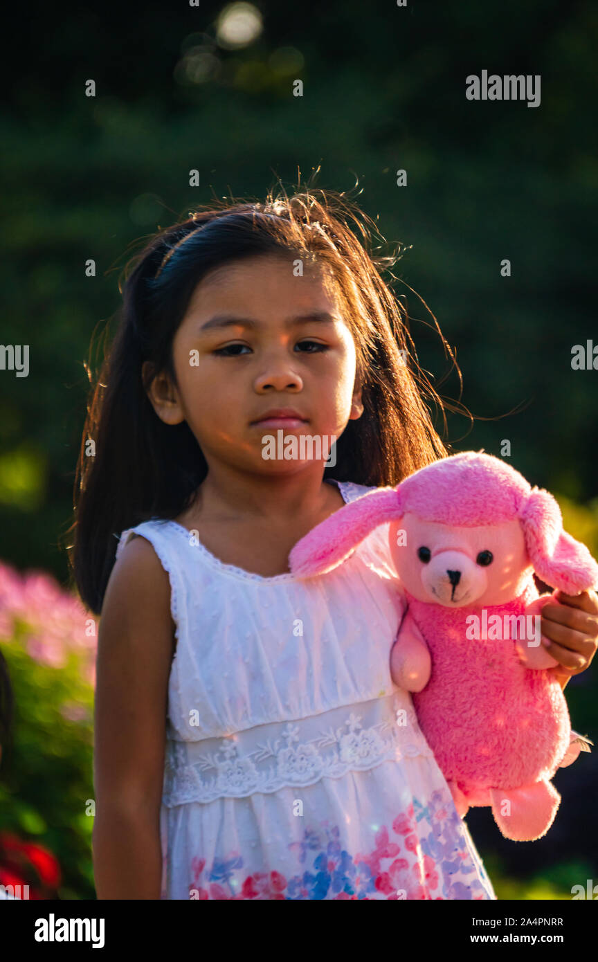 Cute Mexican American children are playing and enjoying bubbles in a ...