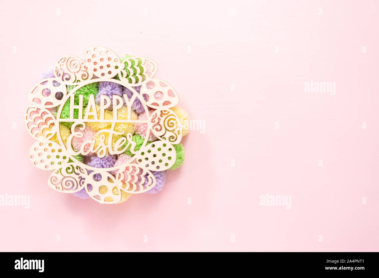 Happy Easter sign and pastel color pom poms on a pink background Stock ...