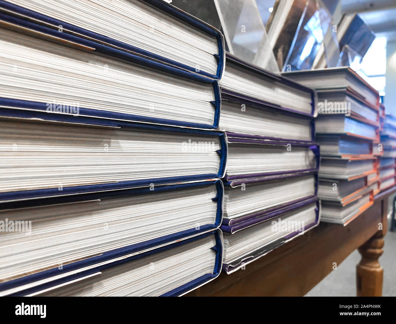 Close up stack of books at the bookstore or library Stock Photo - Alamy